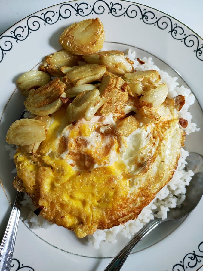 Rice with Fried Garlic and Double Egg Stock Photo - Image of dish ...