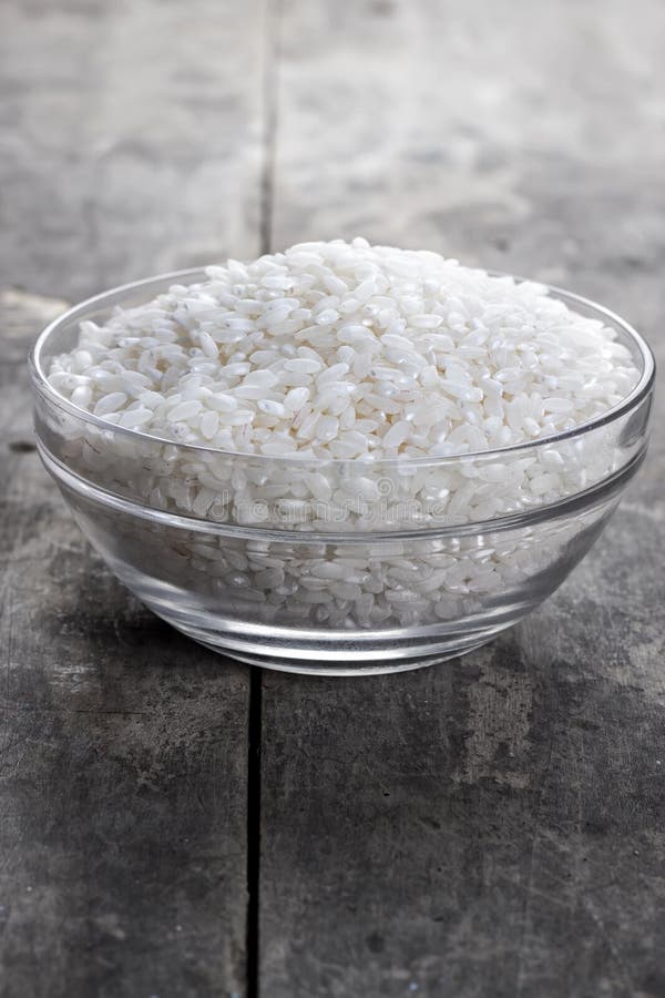 Rice in a glass bowl stock image. Image of wooden, color - 28865545