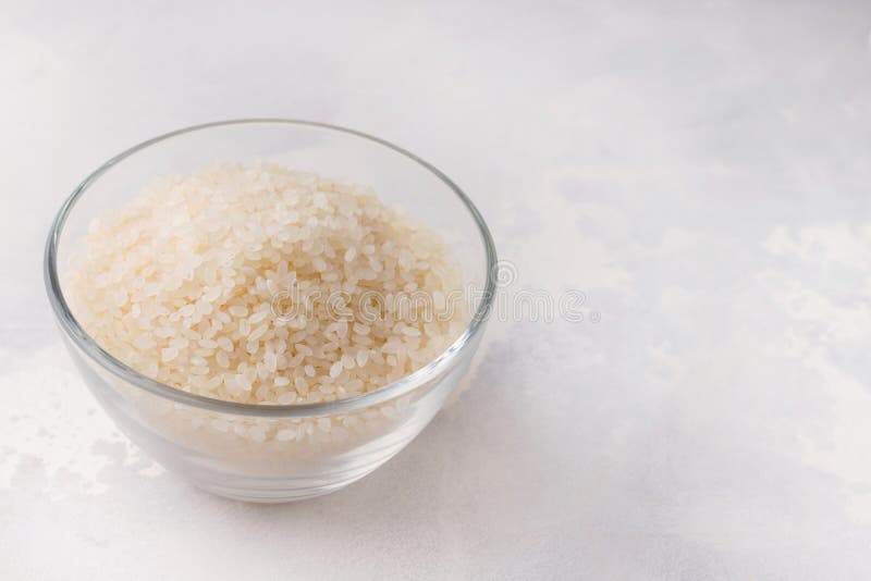 Rice in a Glass Bowl on a White Background. Stock Photo - Image of food ...