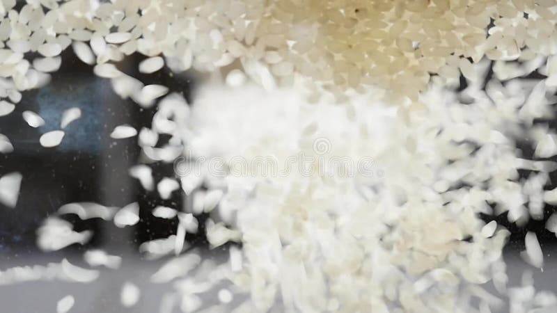Rice Grain Falling on Reflective Table Top on. Bottom View Stock Video ...