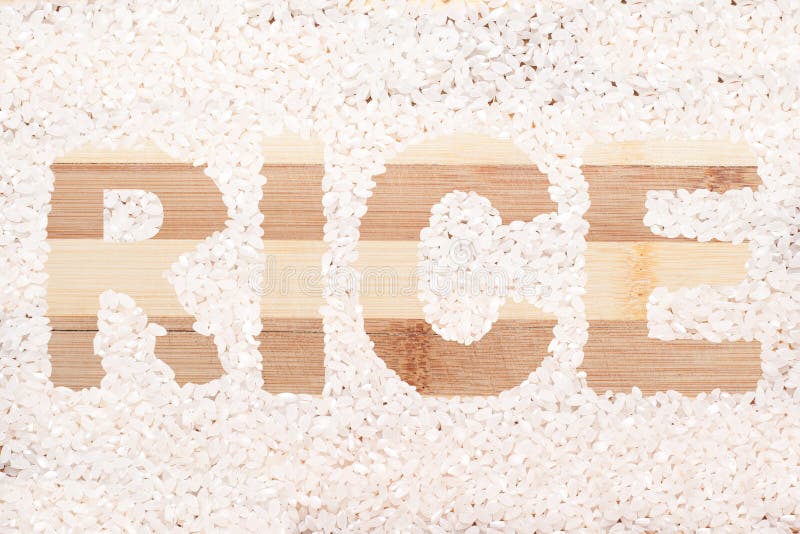 Rice Grain. Word Rice Written on Wooden Cutting Board Stock Photo ...