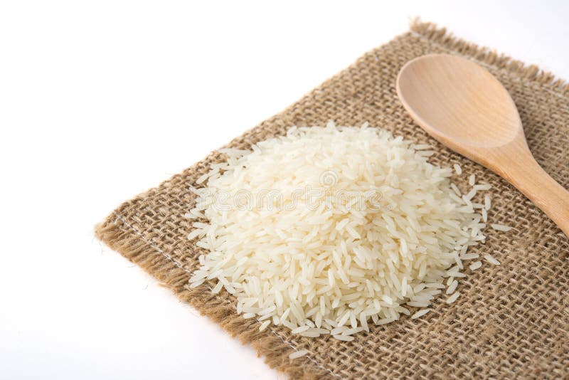 Rice Grains on Old Sack Background. on White Background Stock Image ...