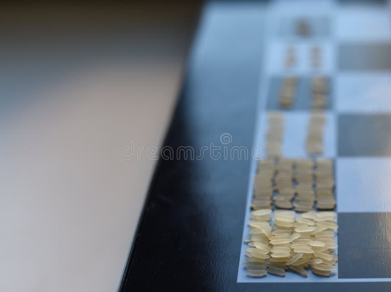 A Geometric Progression of Rice on a Chess Board Stock Photo - Image of ...