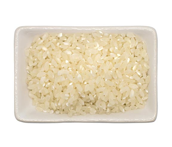 Rice Grains in a White Rectangular Plate on a White Background ...