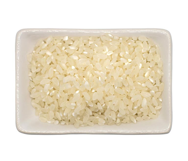 Rice Grains in a White Rectangular Plate on a White Background ...