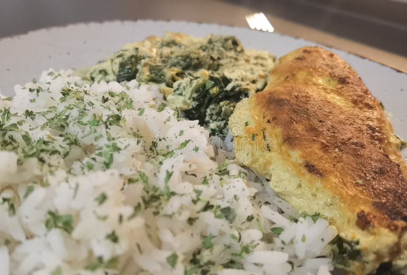 Rice with Gratinated Chicken and Spinach Stock Photo - Image of lunch ...