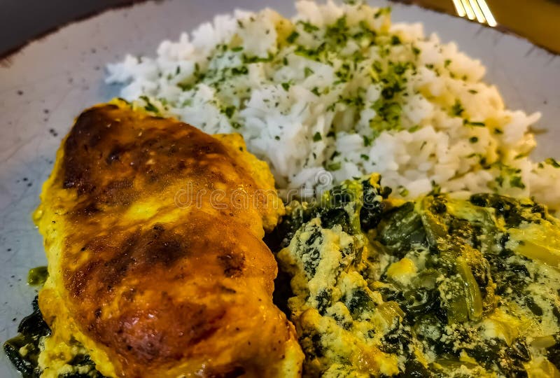 Rice with Gratinated Chicken with Spinach Stock Photo - Image of ...