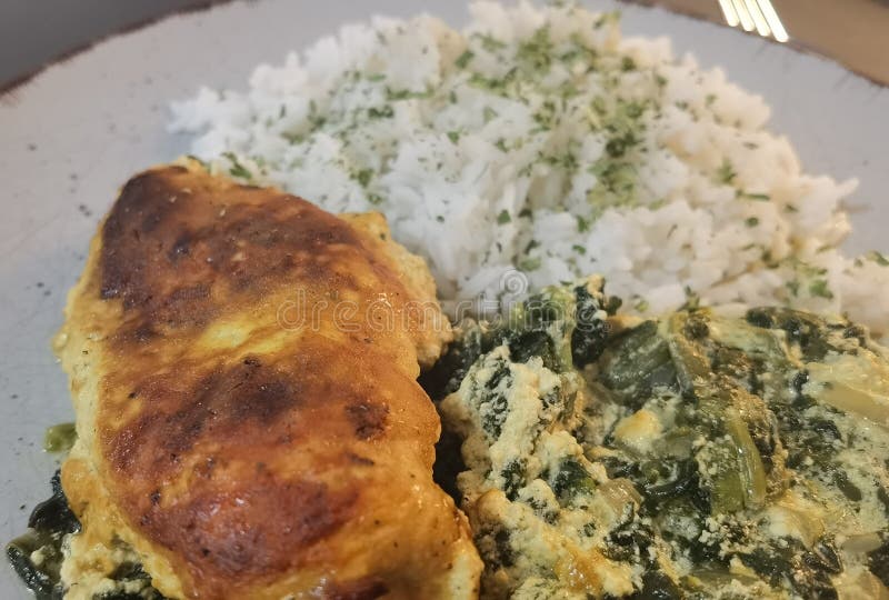 Rice with Gratinated Chicken with Spinach Stock Image - Image of ...