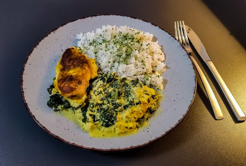Rice with Gratinated Chicken with Spinach Stock Image - Image of ...