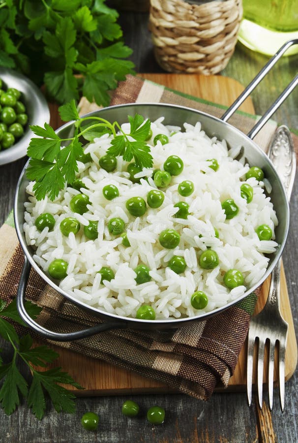 Rice with green peas stock image. Image of dietic, grain - 176476761