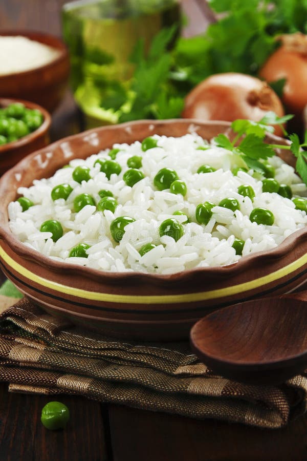 Rice with green peas stock photo. Image of risotto, oriental - 167974898