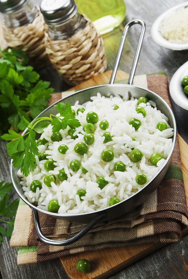 Rice with green peas stock photo. Image of asian, meal - 169076110