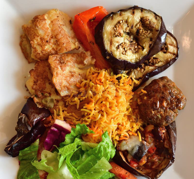 Rice and Grilled Vegetables and Fish on a Plate. Top View Stock Image ...