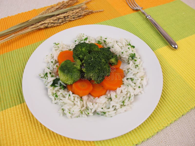 Rice and Herbs with Carrots and Broccoli Stock Photo - Image of cooked ...