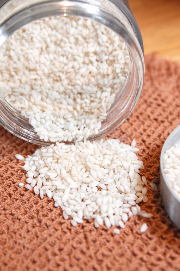 Rice in a jar stock image. Image of healthy, rice, spilled - 315773545