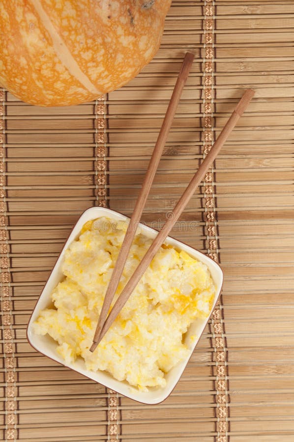 Rice kasha with pumpkin stock image. Image of chopsticks - 45757405