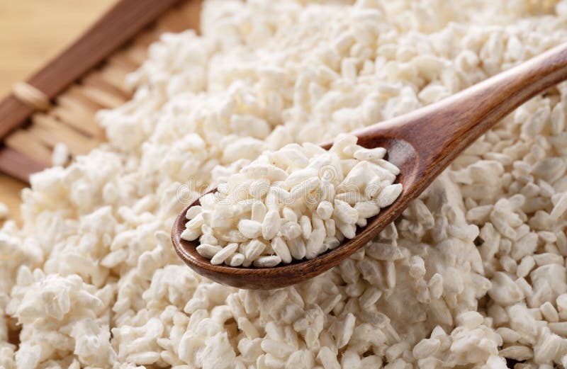 Rice Koji in a Colander on the Table and a Wooden Spoon Stock Photo ...