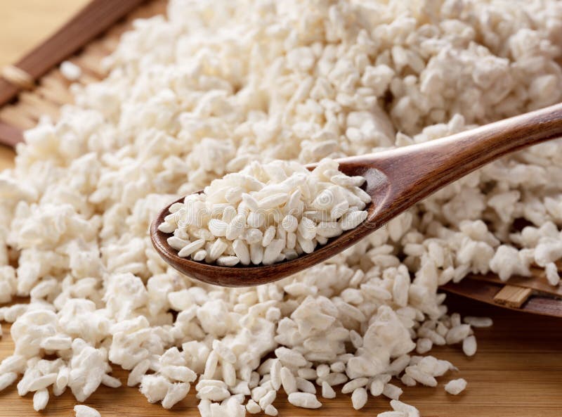 Rice Koji in a Colander on the Table and a Wooden Spoon Stock Image ...