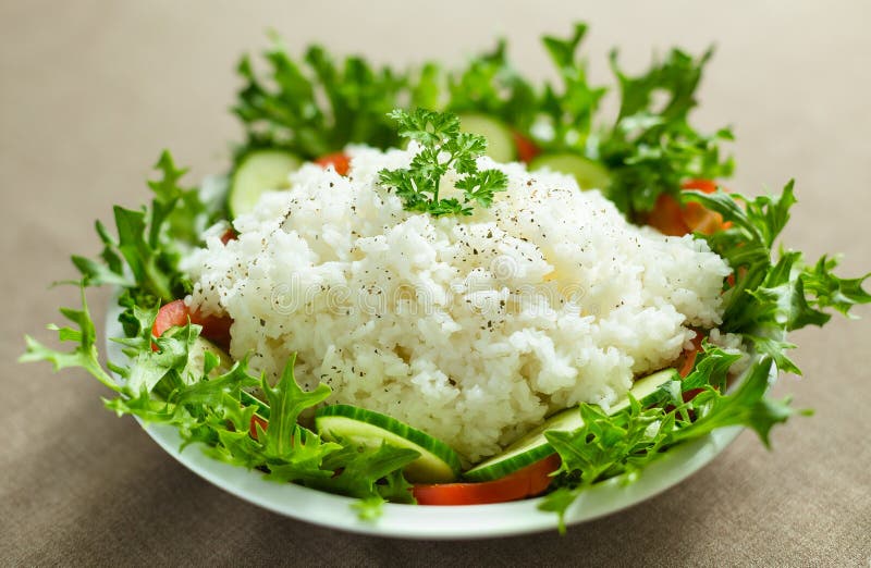 Rice with lettuce stock image. Image of bowl, basmati - 57693727