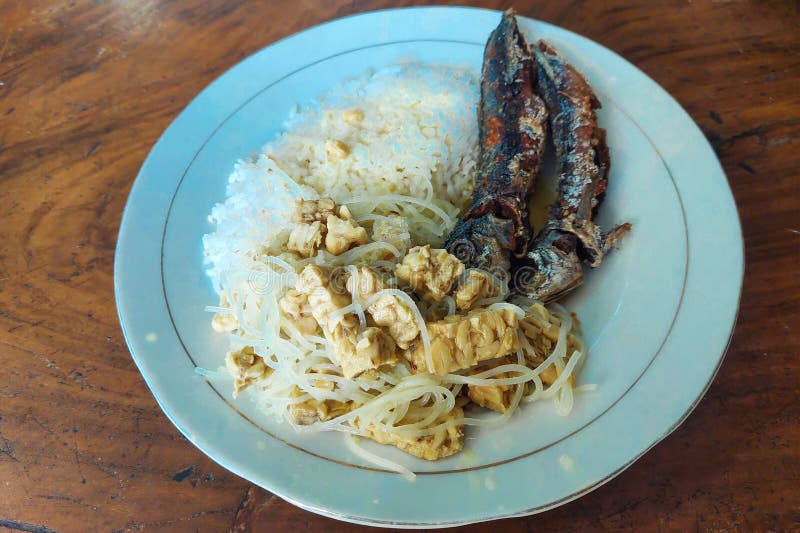 Rice Mixed with Fried Fish and Tempeh Vegetables Stock Photo - Image of ...