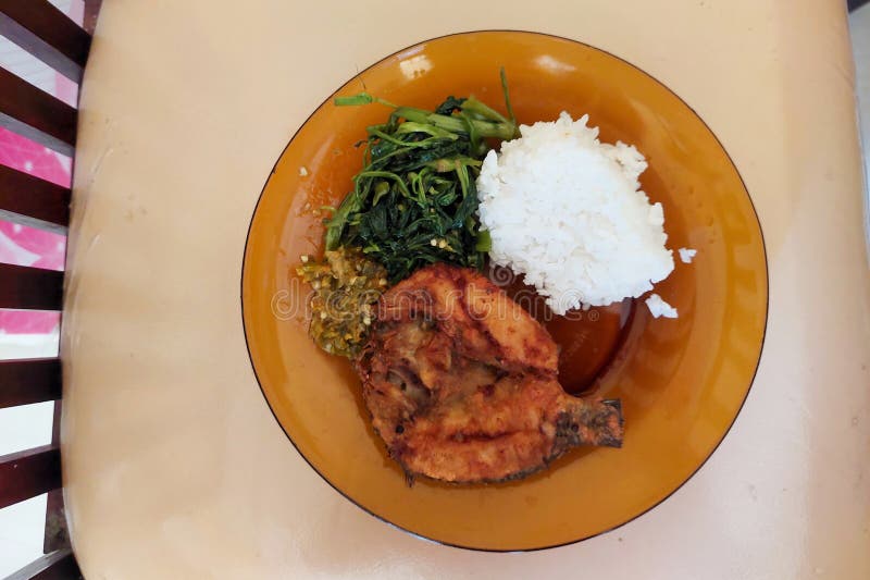 Rice Mixed with Fried Fish and Tempeh Vegetables Stock Photo - Image of ...