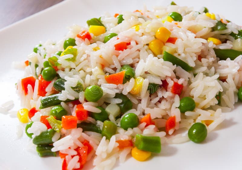 Rice with Mixed Vegetables on White Plate Stock Image - Image of ...