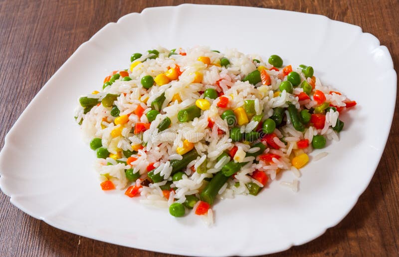 Rice with mixed vegetables stock photo. Image of boiled - 71314850