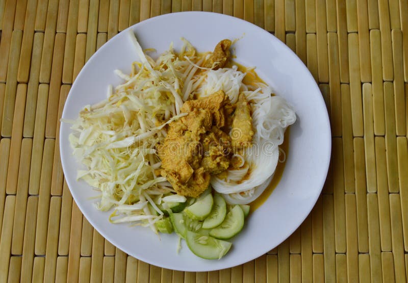 Rice Noodle with Chicken and Fish Curry Sauce on Dish Stock Image ...