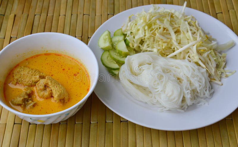 Rice Noodle with Vegetable and Chicken in Fish Curry Sauce Stock Photo ...