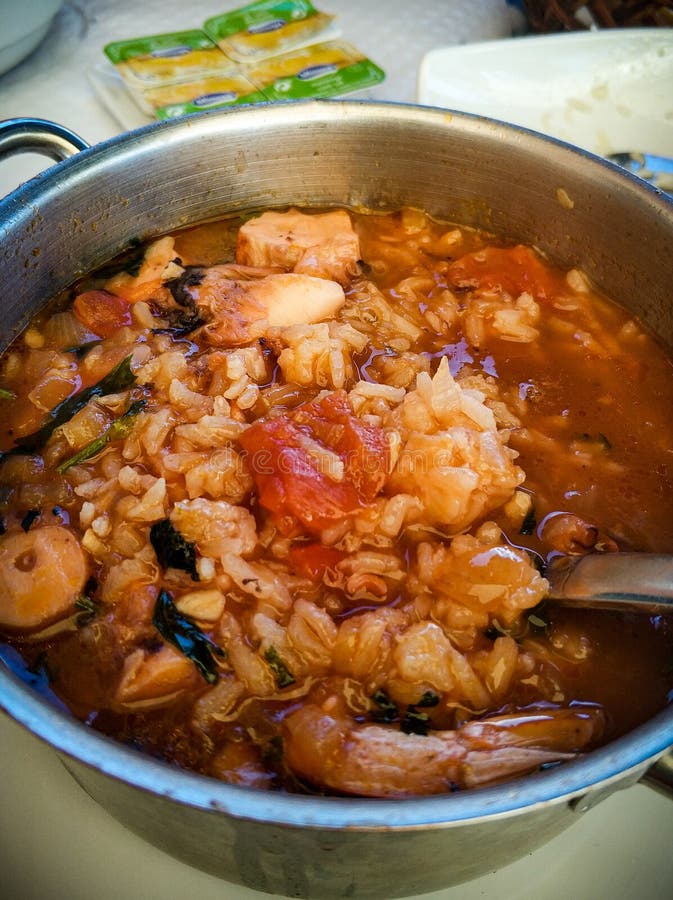 Octopus With Rice Served With Paprika Stock Photo - Image of grilled ...