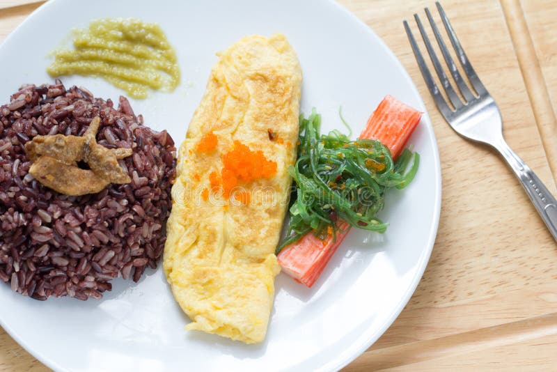 Rice with omelette stock photo. Image of meal, delicious - 148299560