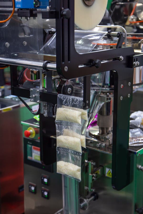 Vertical packing machine stock image. Image of package - 122330599