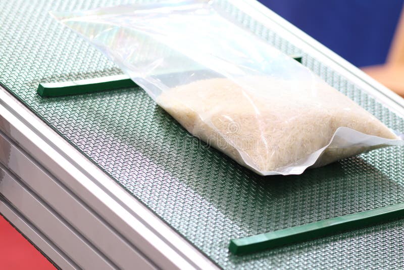 Rice Packing in Plastic Bag on Conveyor Line Stock Photo - Image of ...