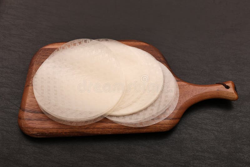 Rice Paper is Made by Adding Water To Crushed Rice, Stretching it into ...