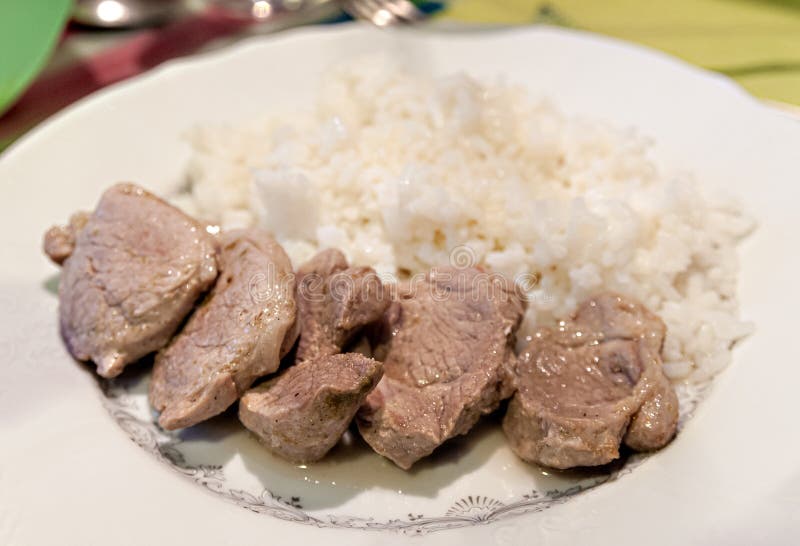 Rice with Pieces of Meat on a Plate Stock Photo - Image of delicious ...