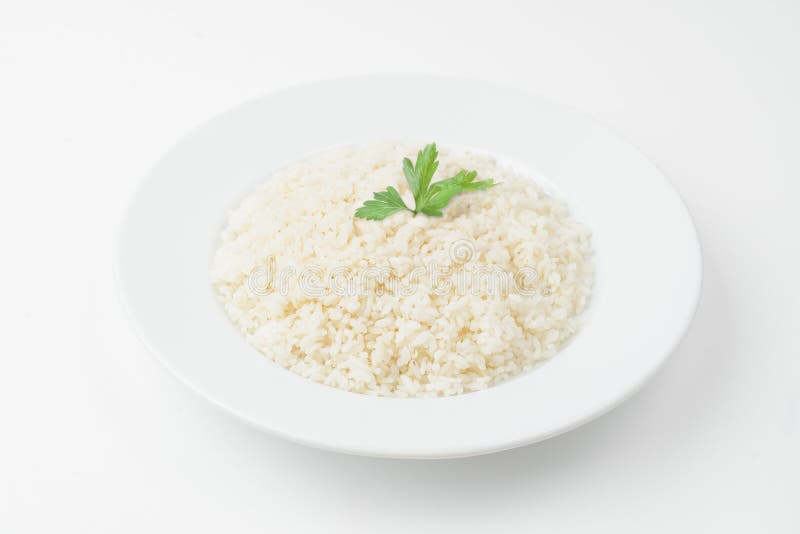 Rice on plate on white stock image. Image of spicy, rice - 146993371