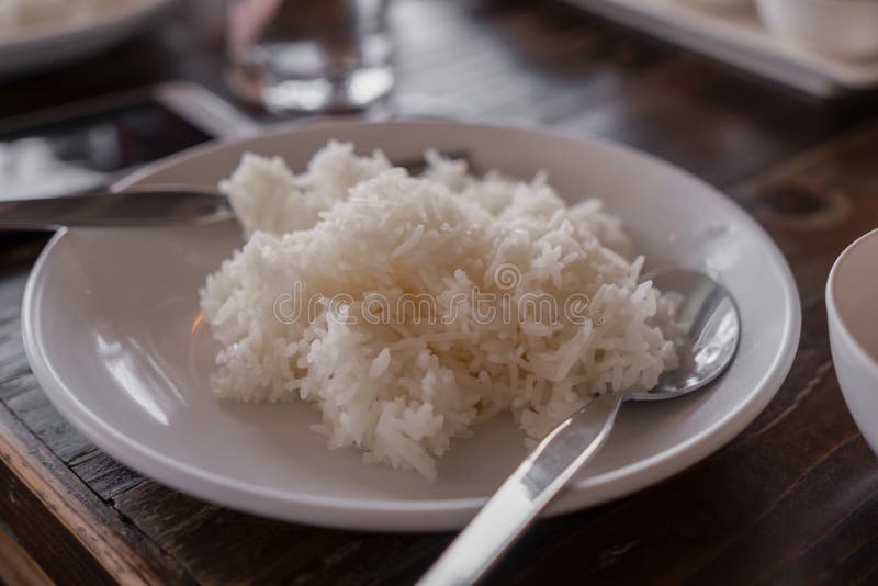 Rice in Plates and Utensils, Ready To Eat Stock Image - Image of fiber ...