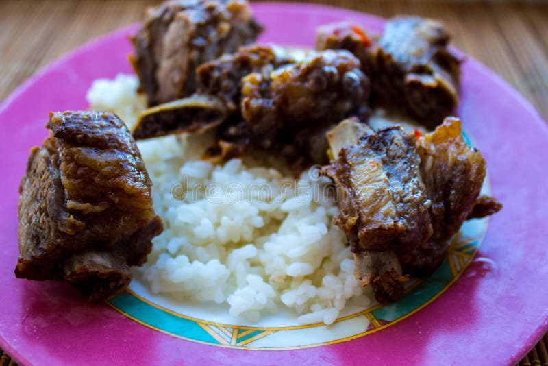 A Rice with Pork Ribs on a Plate Stock Photo - Image of background ...