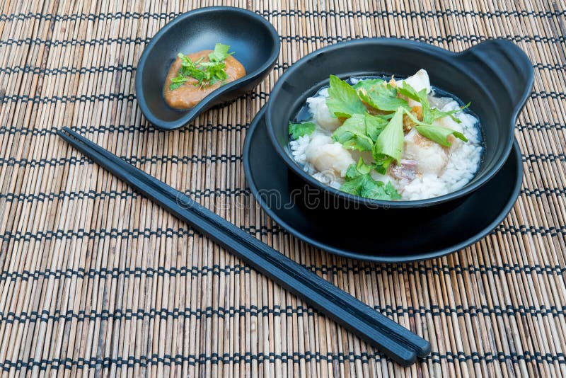 Rice porridge with fish stock photo. Image of traditional - 66295986