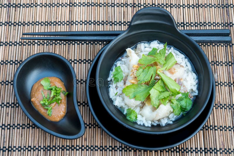 Rice porridge with fish stock photo. Image of cuisine - 66385590