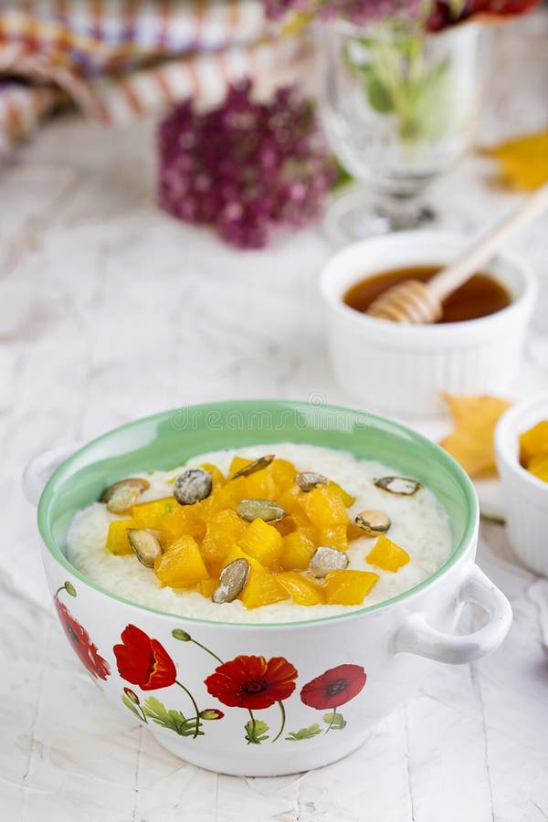 Rice porridge with pumpkin stock photo. Image of milk - 101405960