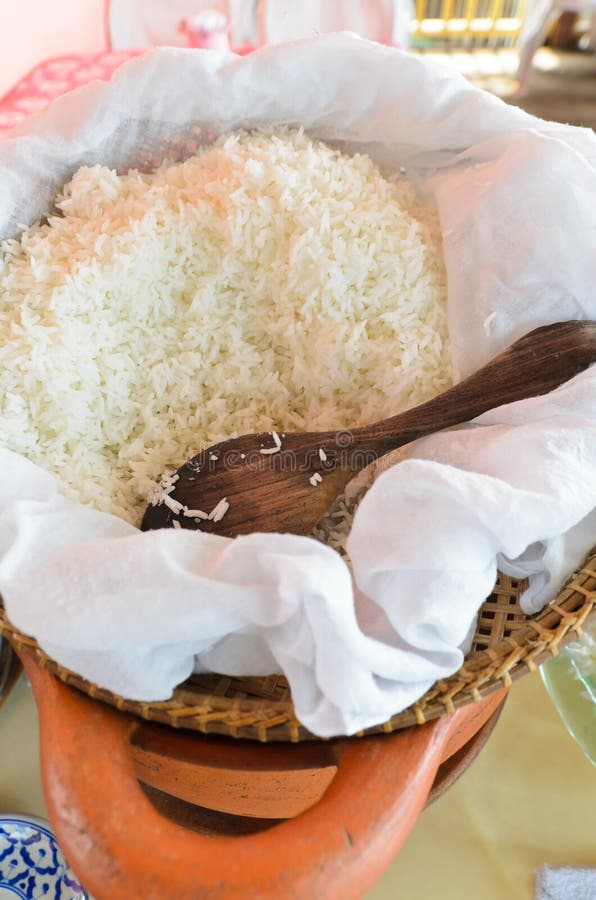 Rice in pot with spoon stock photo. Image of cooking - 30685934