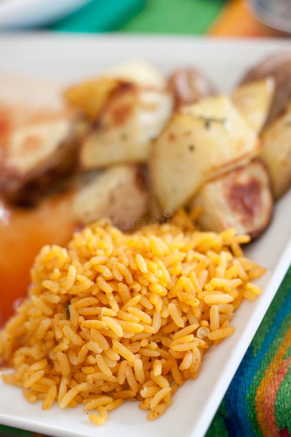 Rice and potatoes stock image. Image of table, yellow - 19780119