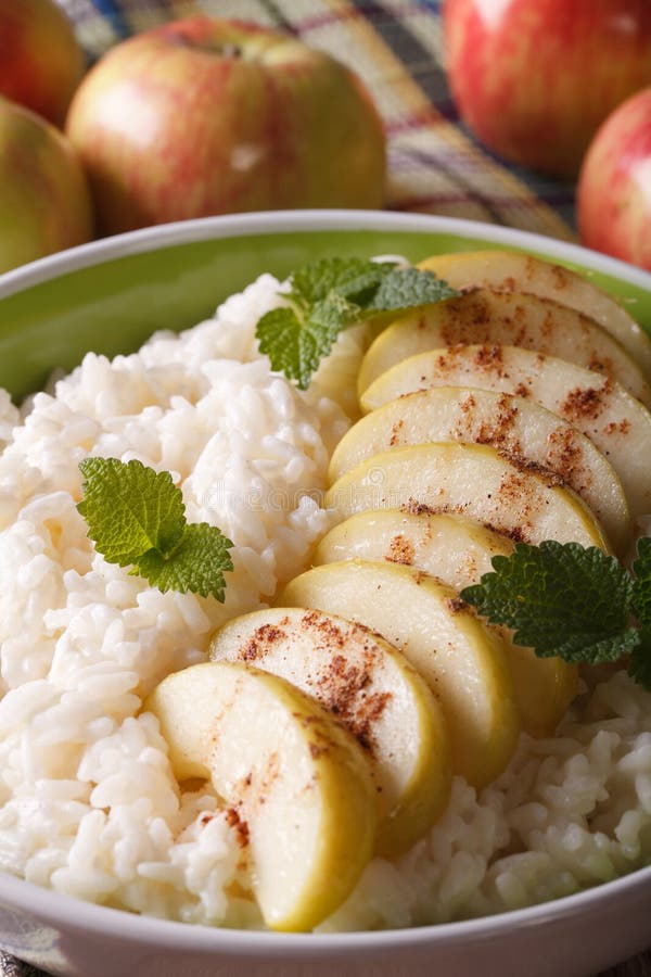 Rice Pudding with Apple and Cinnamon Macro. Vertical Stock Image ...