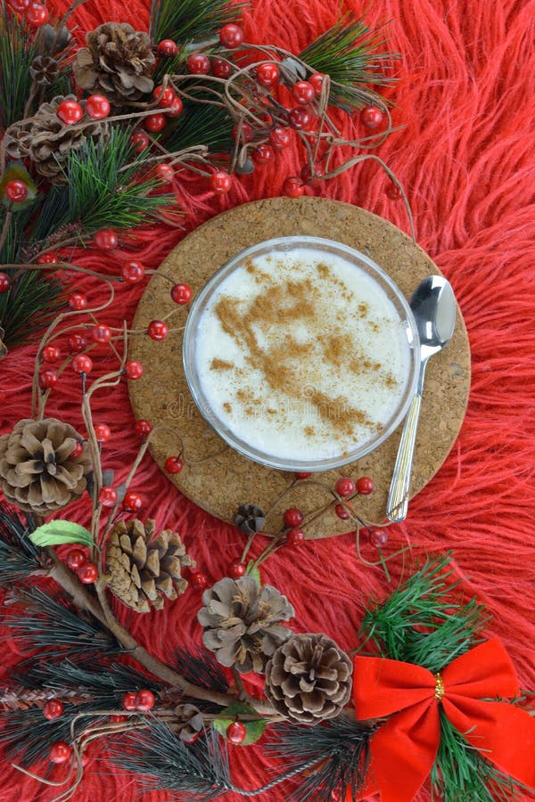 Rice Pudding and Artificial Evergreen Branches Stock Image - Image of ...
