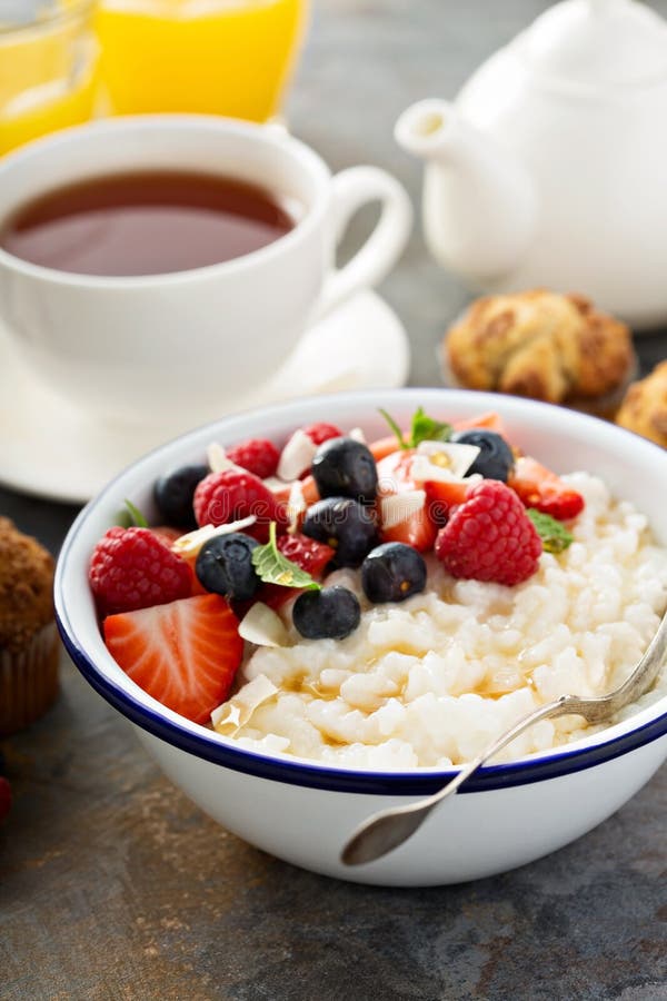 Rice Pudding with Fresh Berries and Coconut for Breakfast Stock Image ...