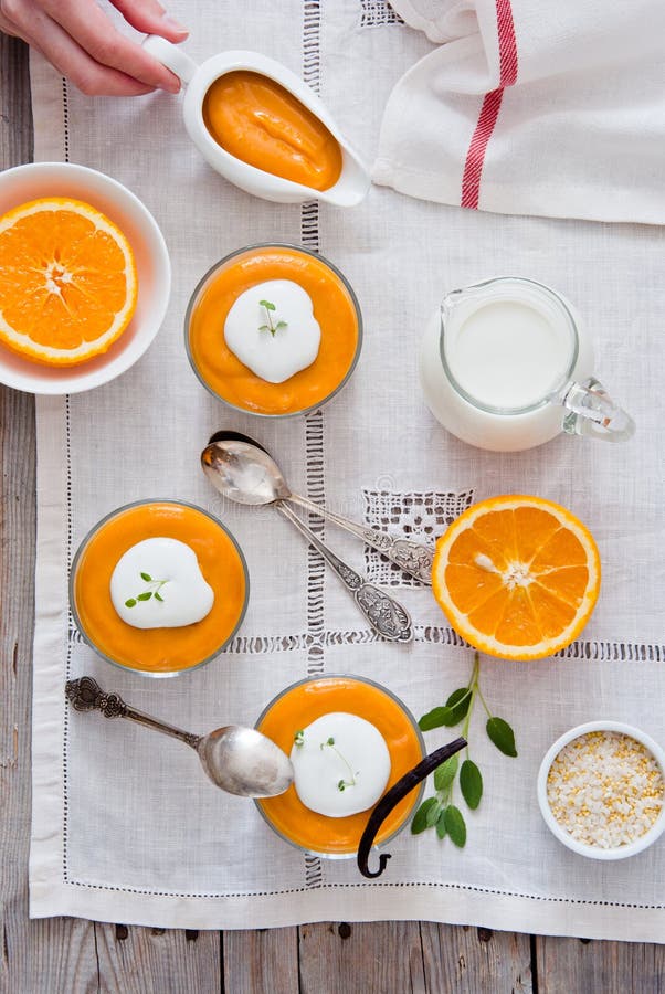 Rice Pudding with Orange Custard Stock Photo - Image of custard ...