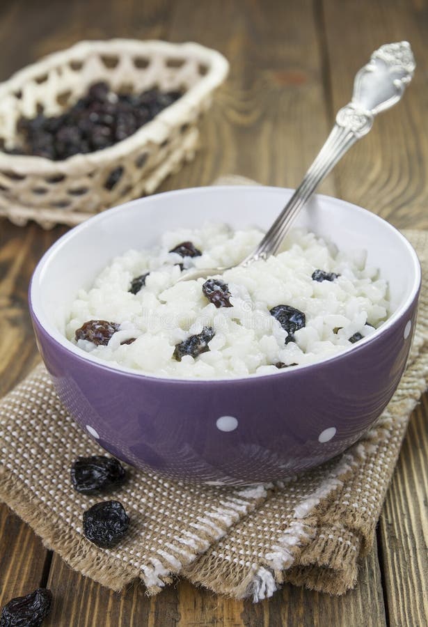 Rice pudding with raisins stock image. Image of eating - 34302639