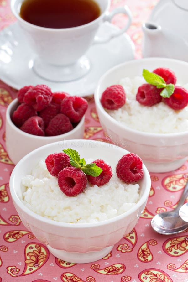 Rice Pudding with Raspberries Stock Photo - Image of milky, glass: 49154332