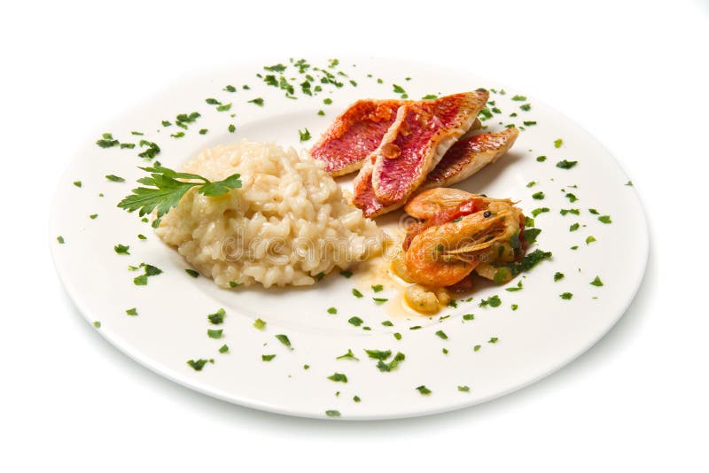 Rice with Red Mullet Fillets and Seafood Stock Image - Image of healthy ...
